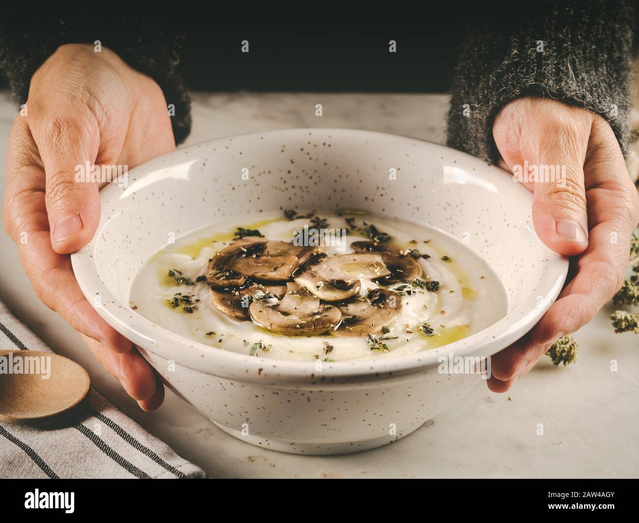 Hands holding bowl vegetable soup hi-res stock photography and images ...