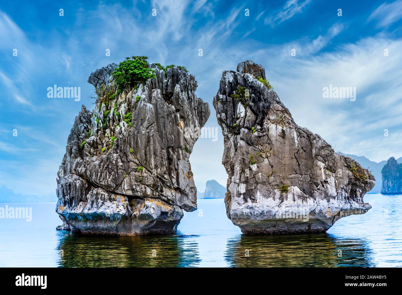 The scenic limestone karst mountains in Halong Bay, North Vietnam, Asia ...