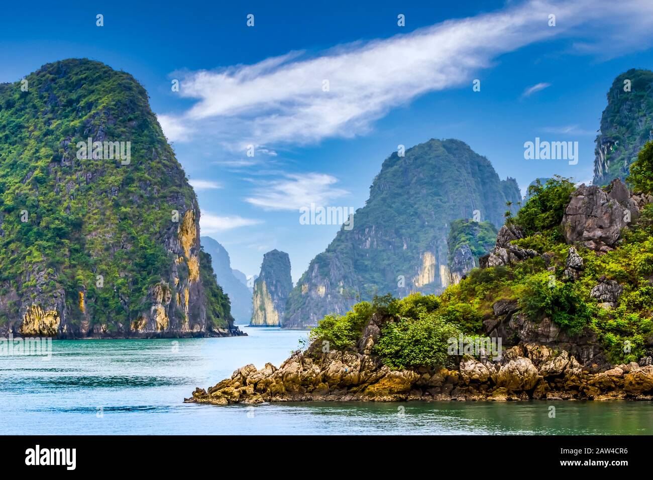 The scenic limestone karst mountains in Halong Bay, North Vietnam, Asia ...