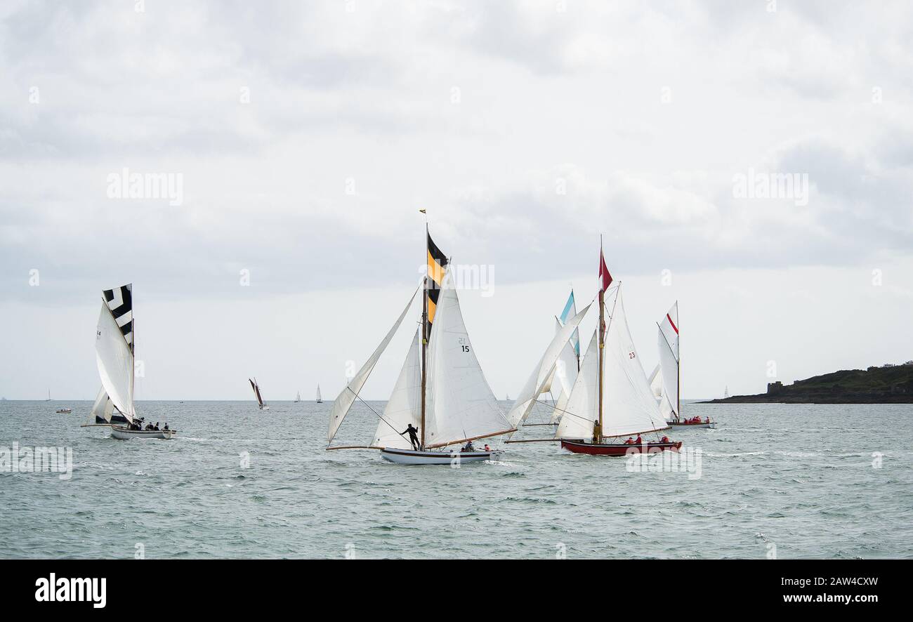 Traditional Falmouth working boats in full sail in the breezes of the ...