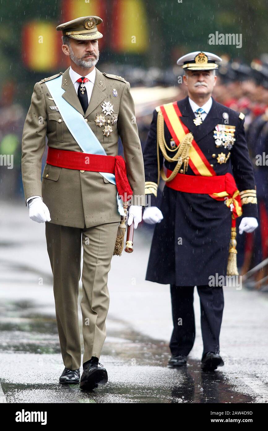 King Felipe VI of Spain attends the National Day military parade ...