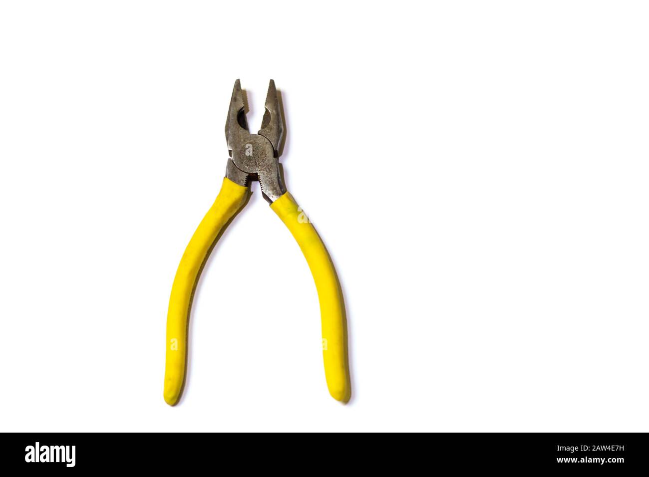pliers isolated work tool, yellow handle equipment Stock Photo - Alamy