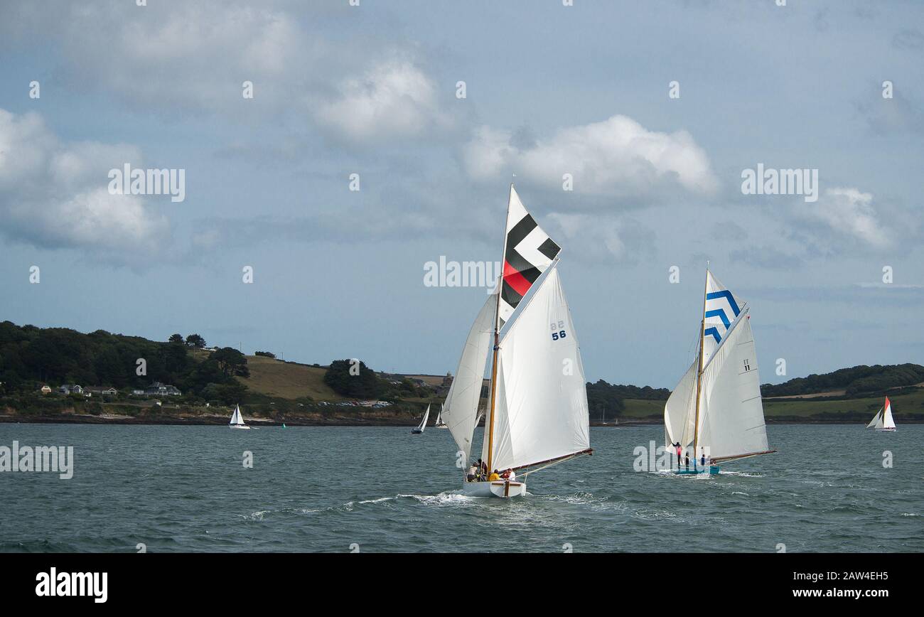 Traditional Falmouth working boats in full sail in the breezes of the ...