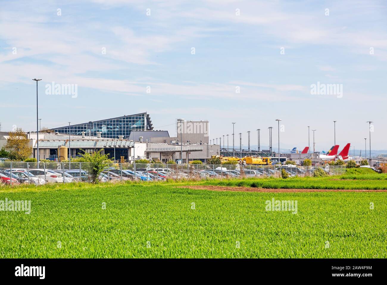 Airport Stuttgart, Terminal, exterior view with green field in ...