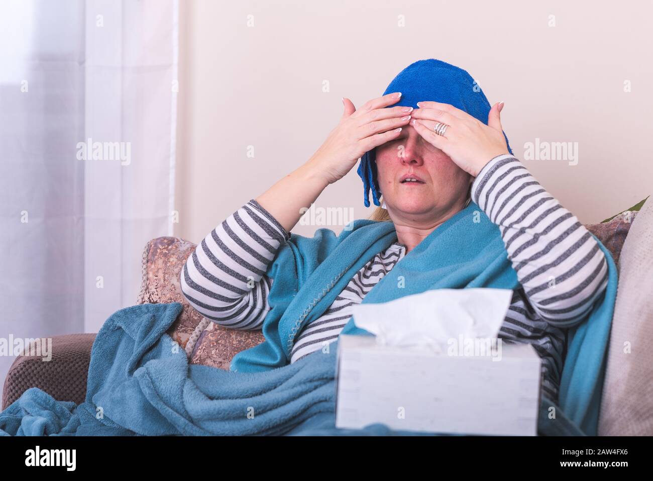 Very sick woman with the flu, fever and high temperature Stock Photo ...