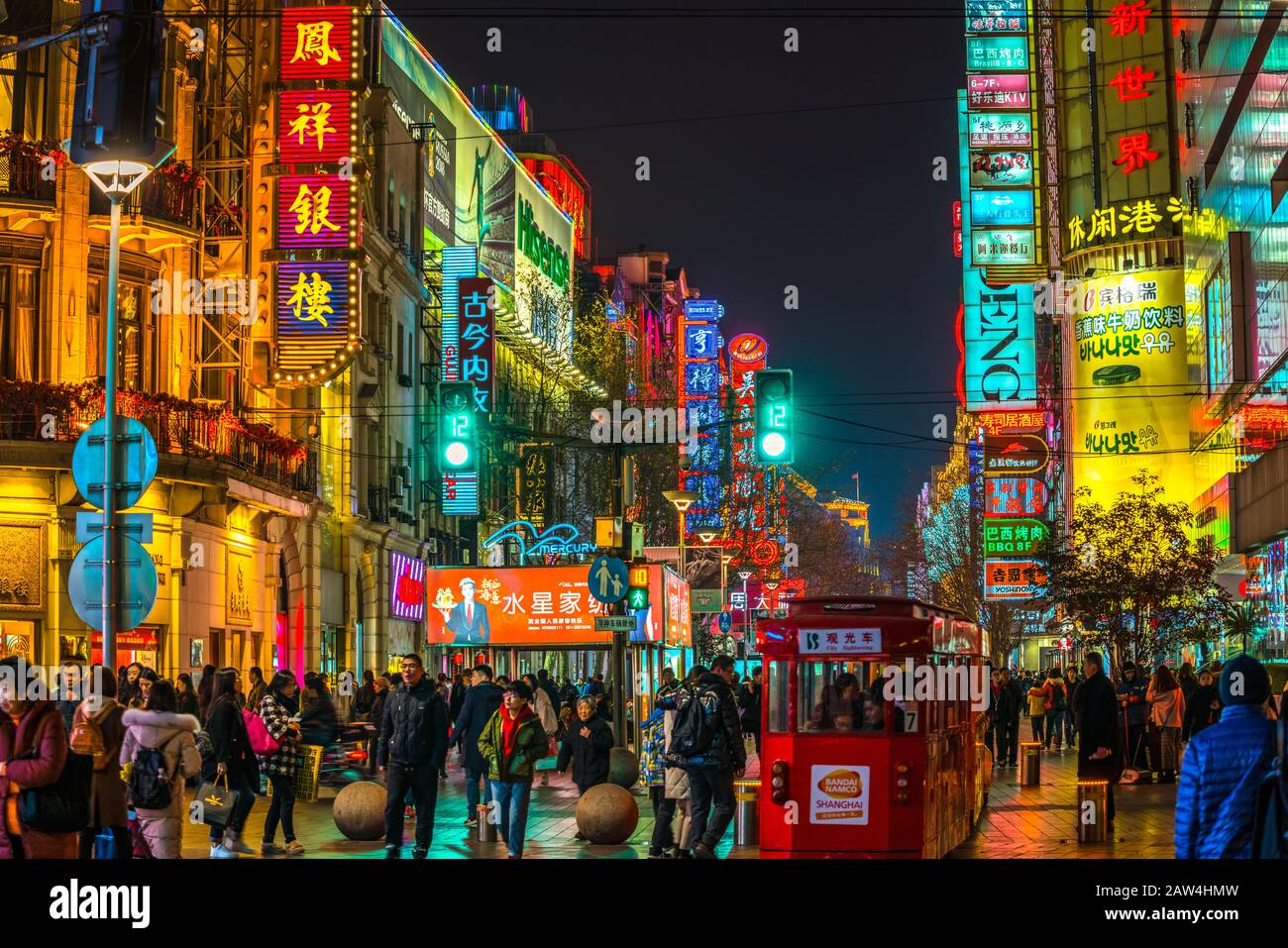 SHANGHAI, CHINA - FEBRUARY 13, 2018: Neon signs lit on Nanjing Road ...