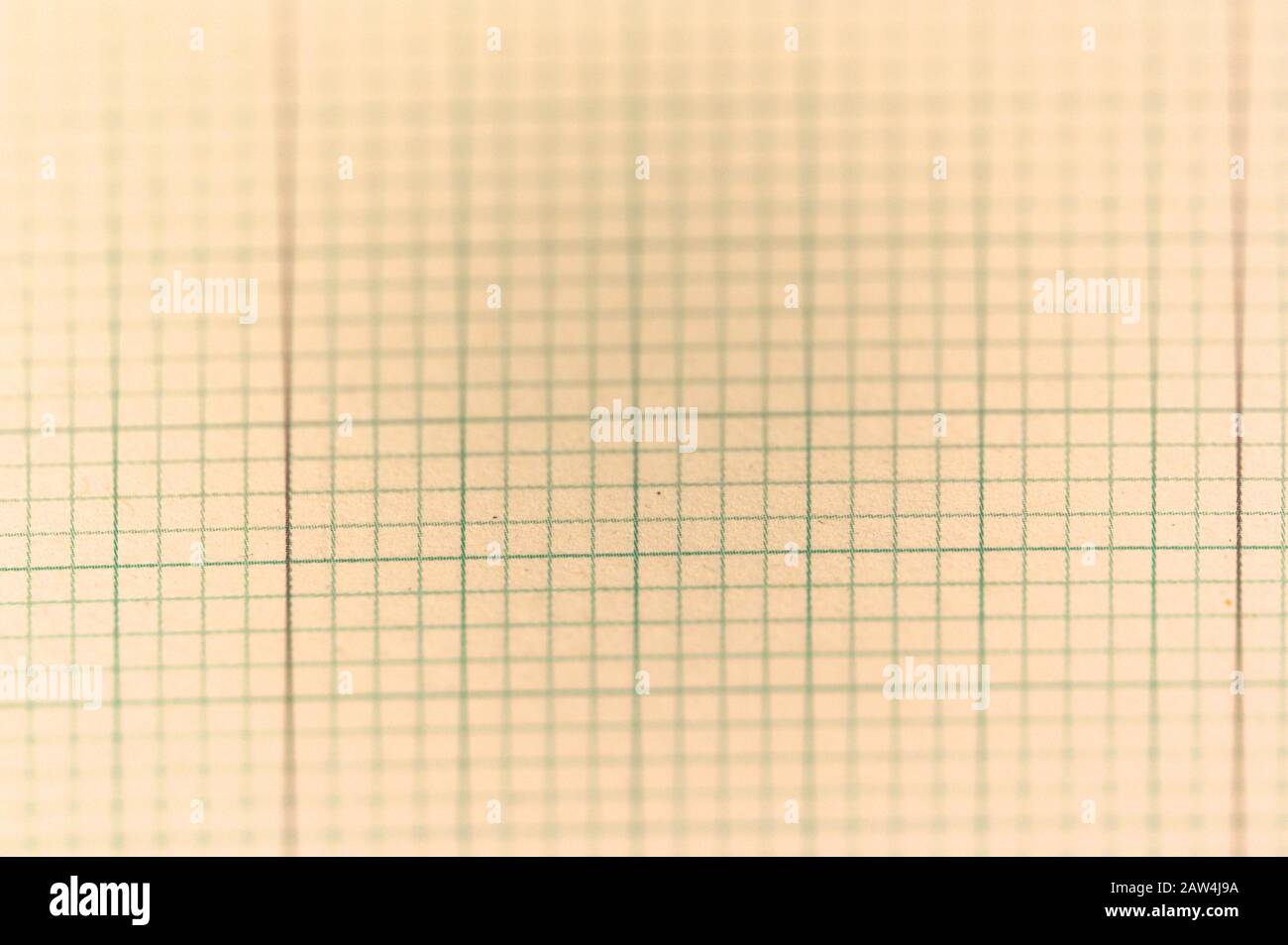 Close-up of a grid sheet with a partial blur effect and old color. For ...