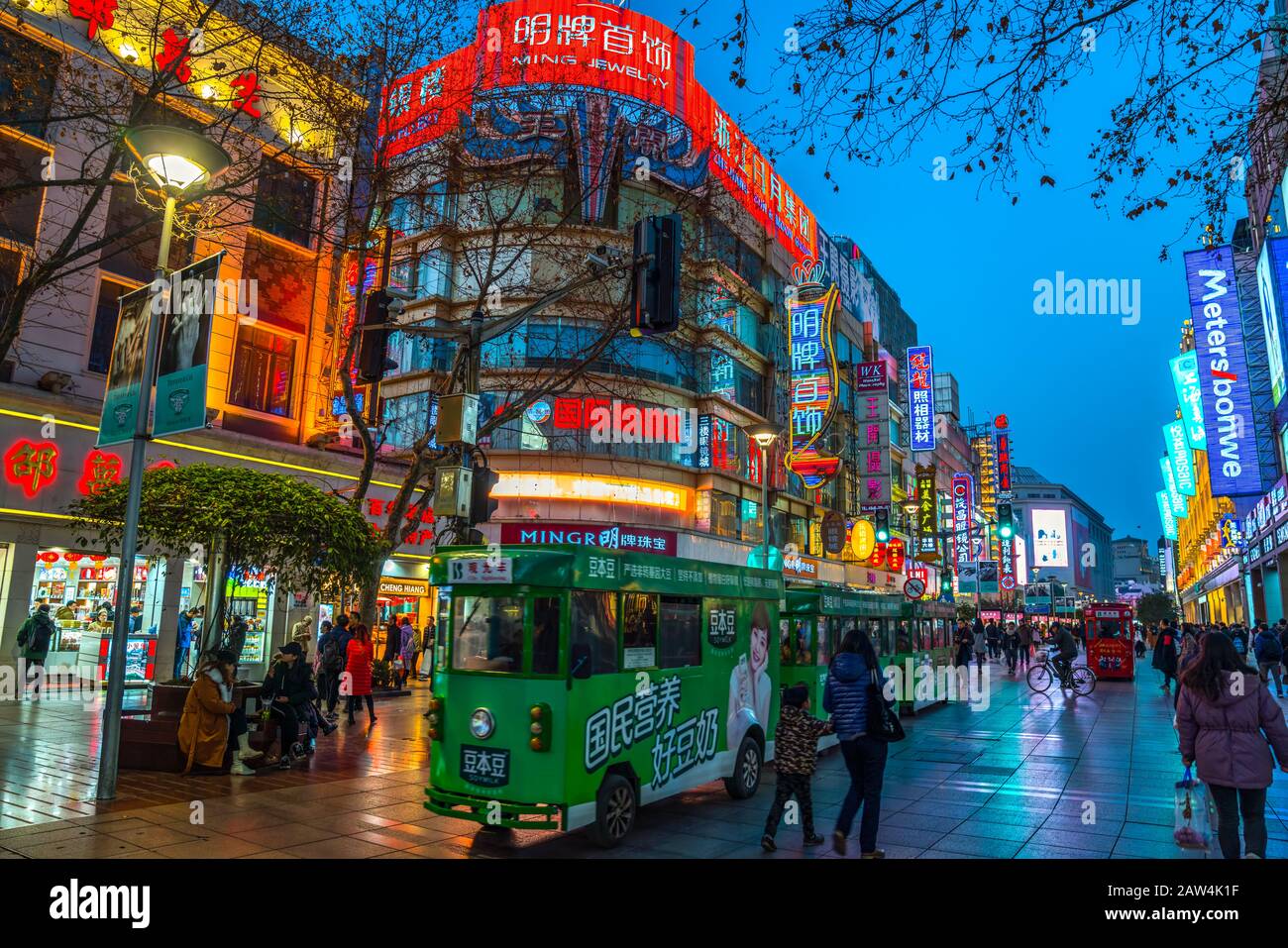 SHANGHAI, CHINA - FEBRUARY 13, 2018: Neon signs lit on Nanjing Road ...