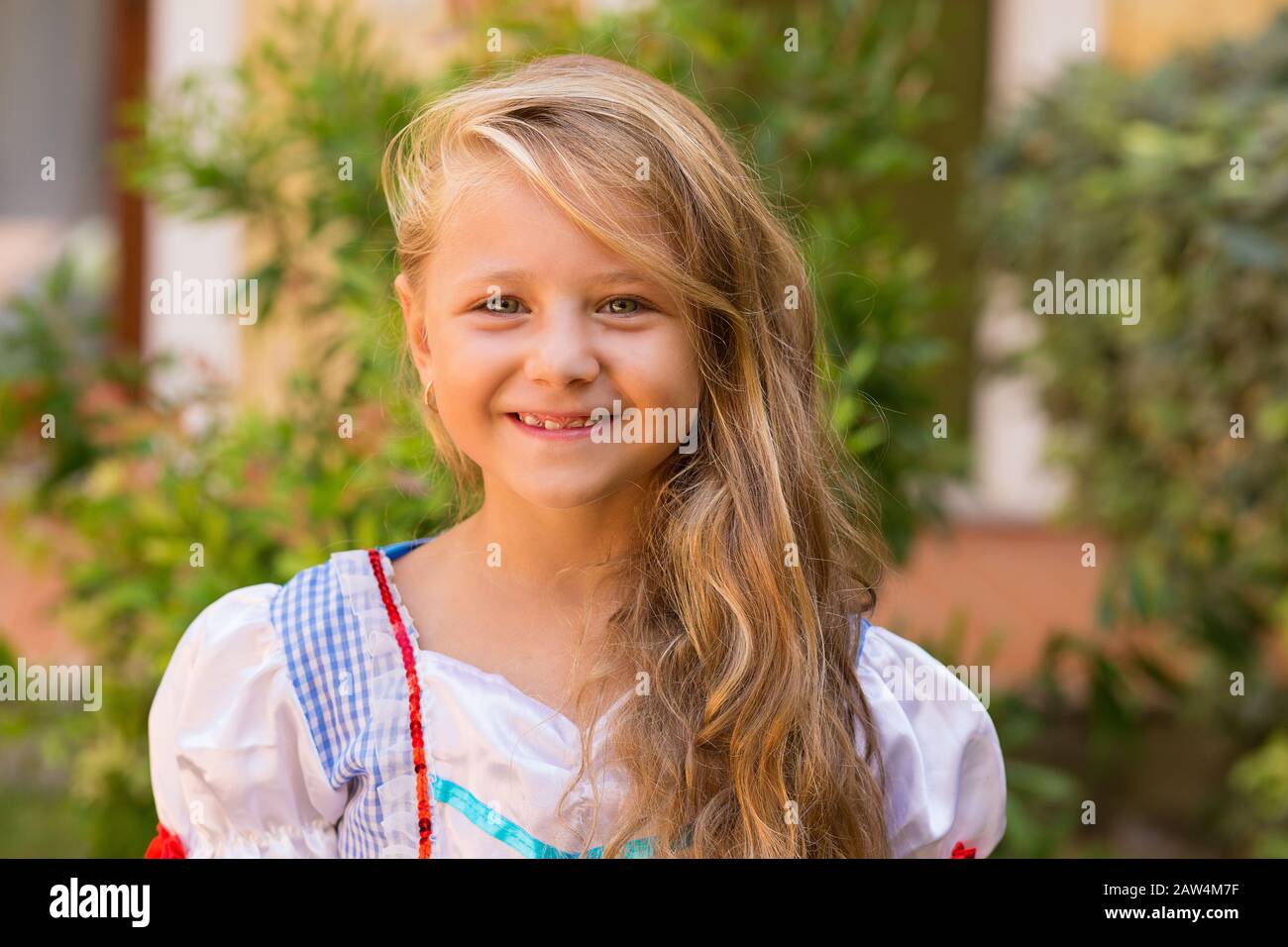 What a beautiful day. Child smiles had a bHappy little girl smiling at ...