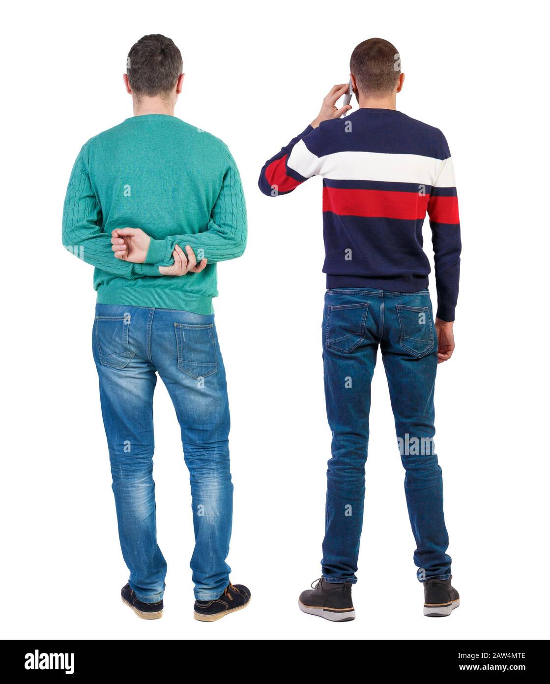 Back view of two man in sweater with mobile phone. Rear view people ...