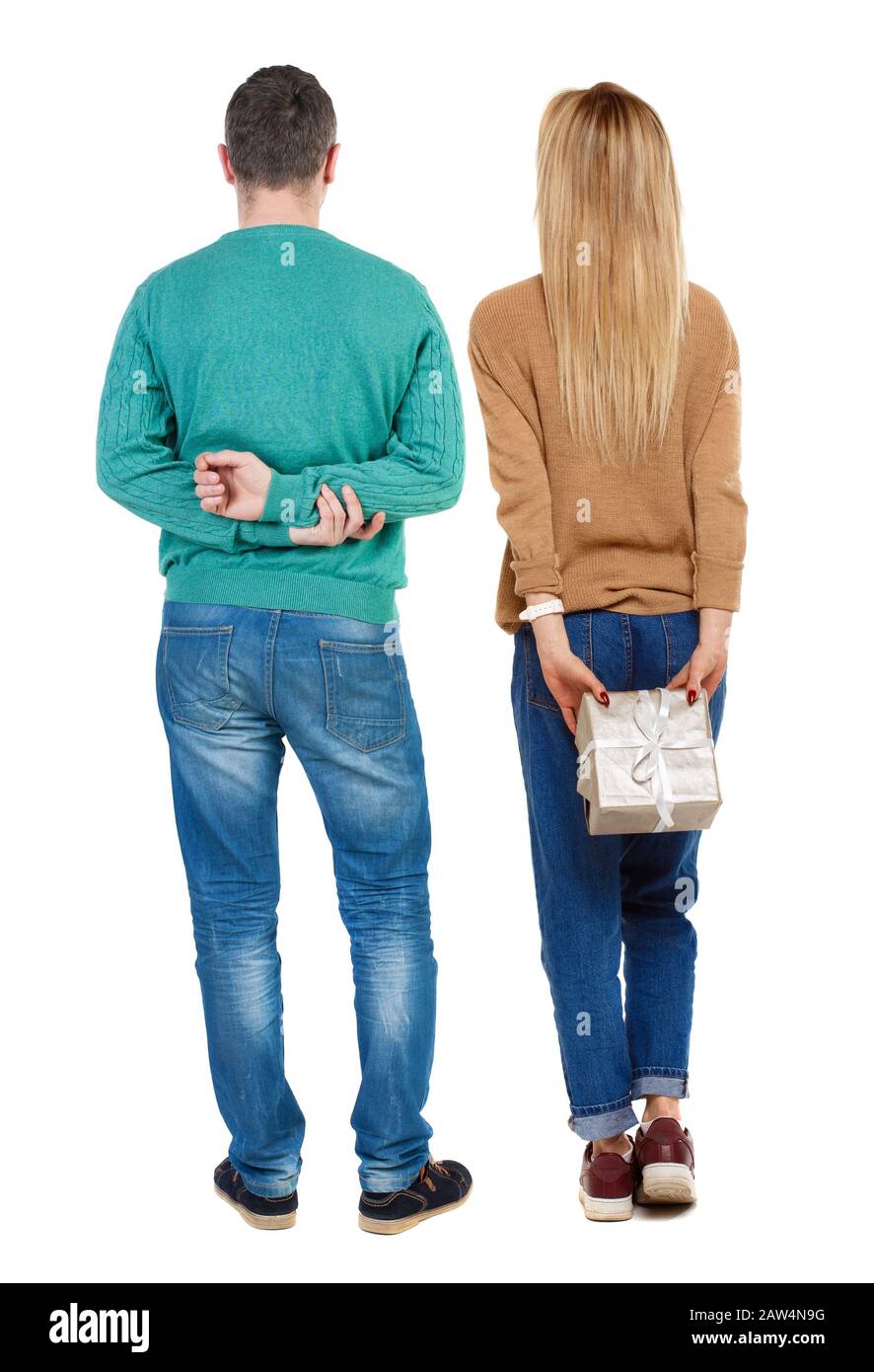 Back view of couple in sweater. beautiful friendly girl and guy ...