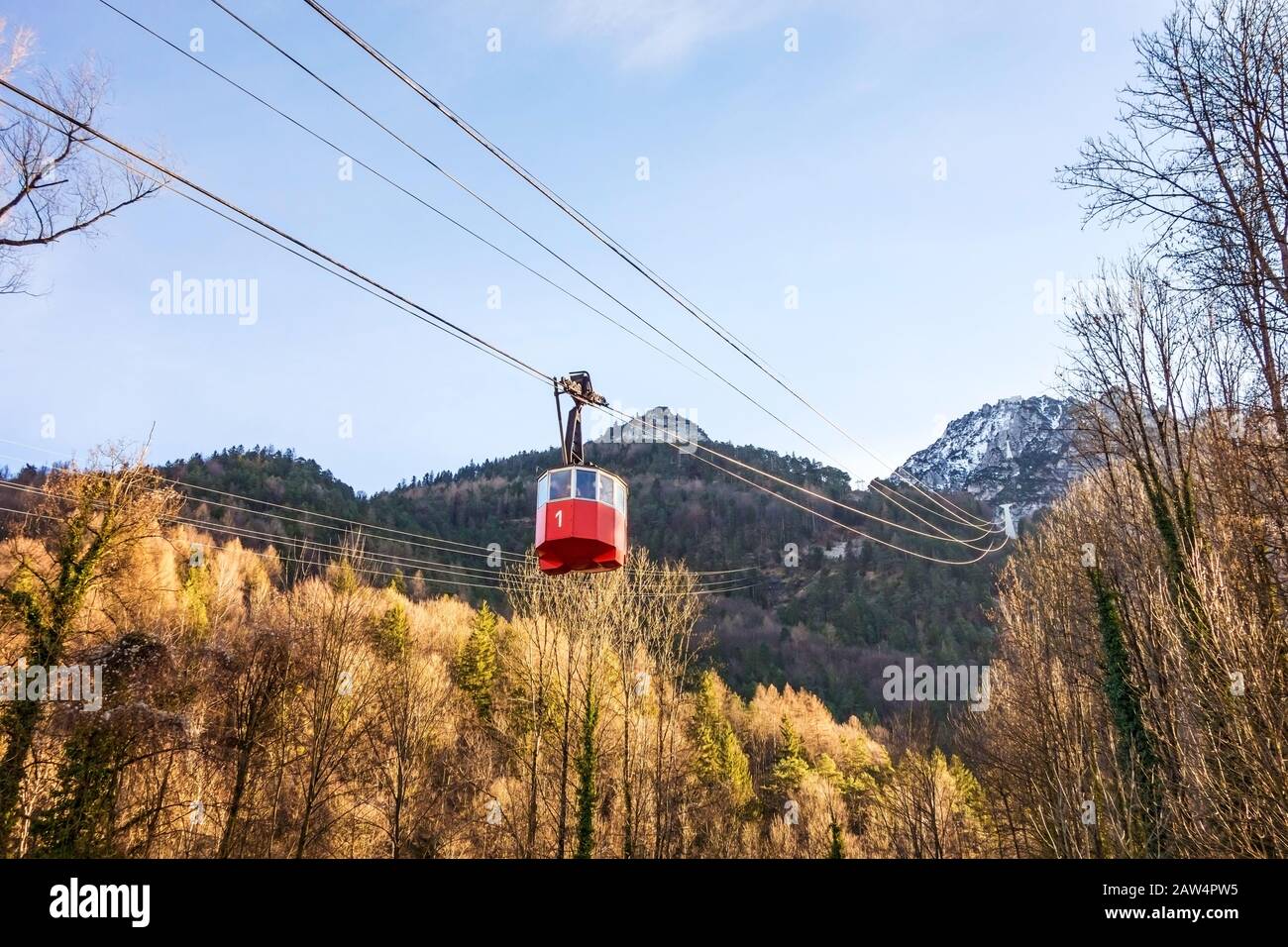 Ropeway gondola on its way to the summit station of mountain Stock ...