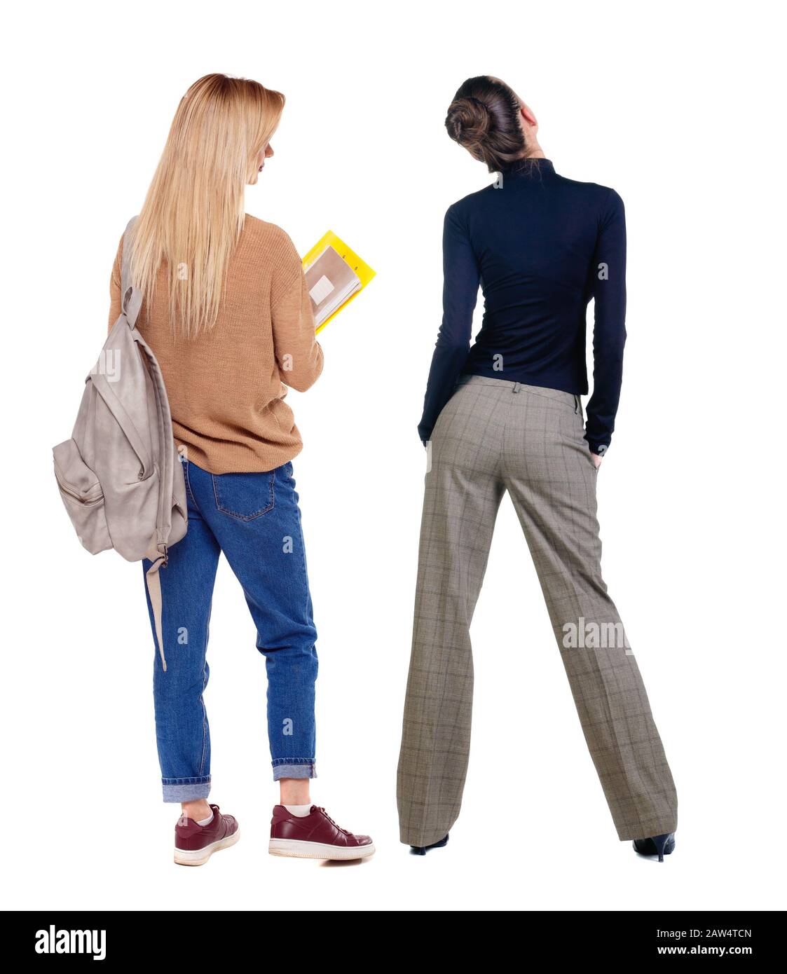 Back view of two woman in sweater. beautiful friendly girl and guy ...