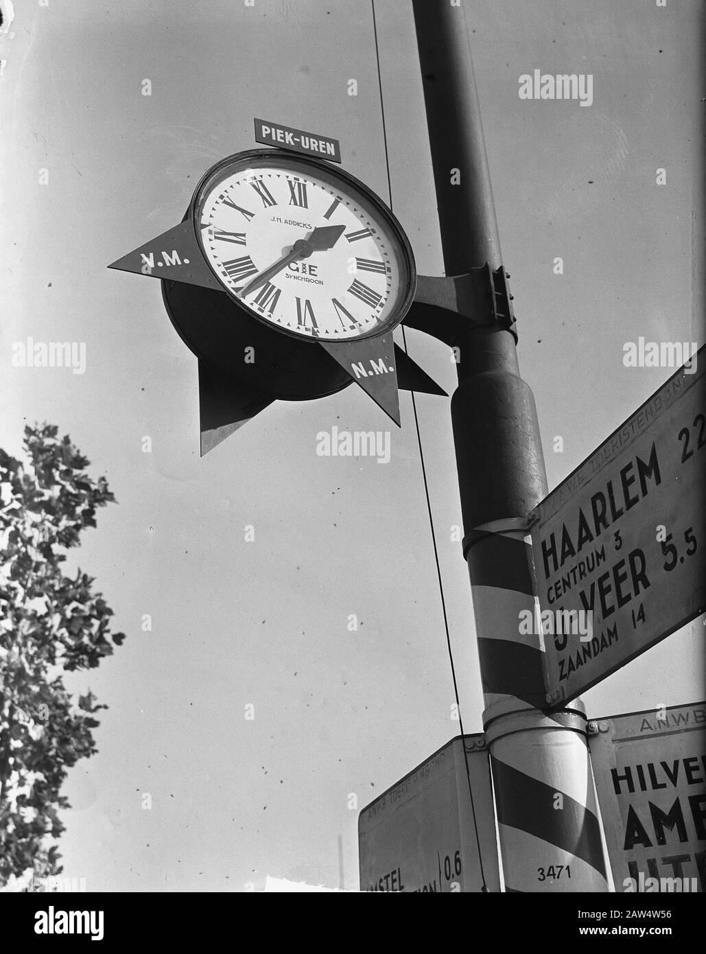 Clock with peak Date: October 24, 1950 Stock Photo - Alamy
