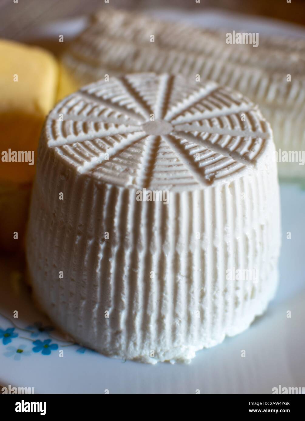 One piece of fresh soft italian white ricotta cheese Stock Photo - Alamy