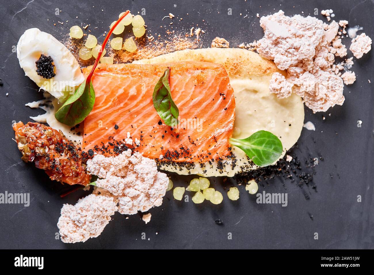 Closeup Salmon steak fillet with eggs and vegetables. Restaurant menu ...