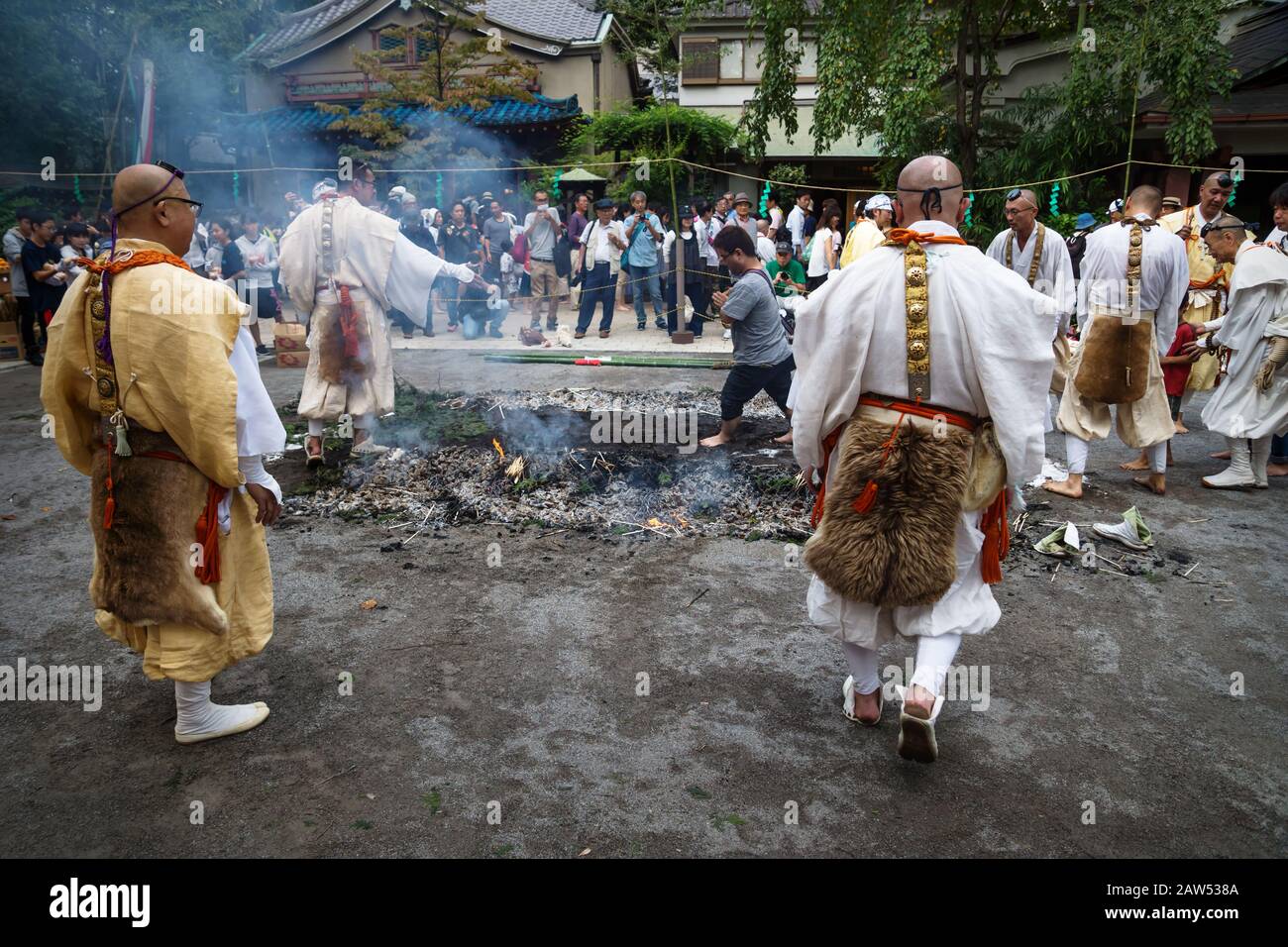 Tokyo, Japan - September 24 2017: Man praying while fire walk ceremony ...
