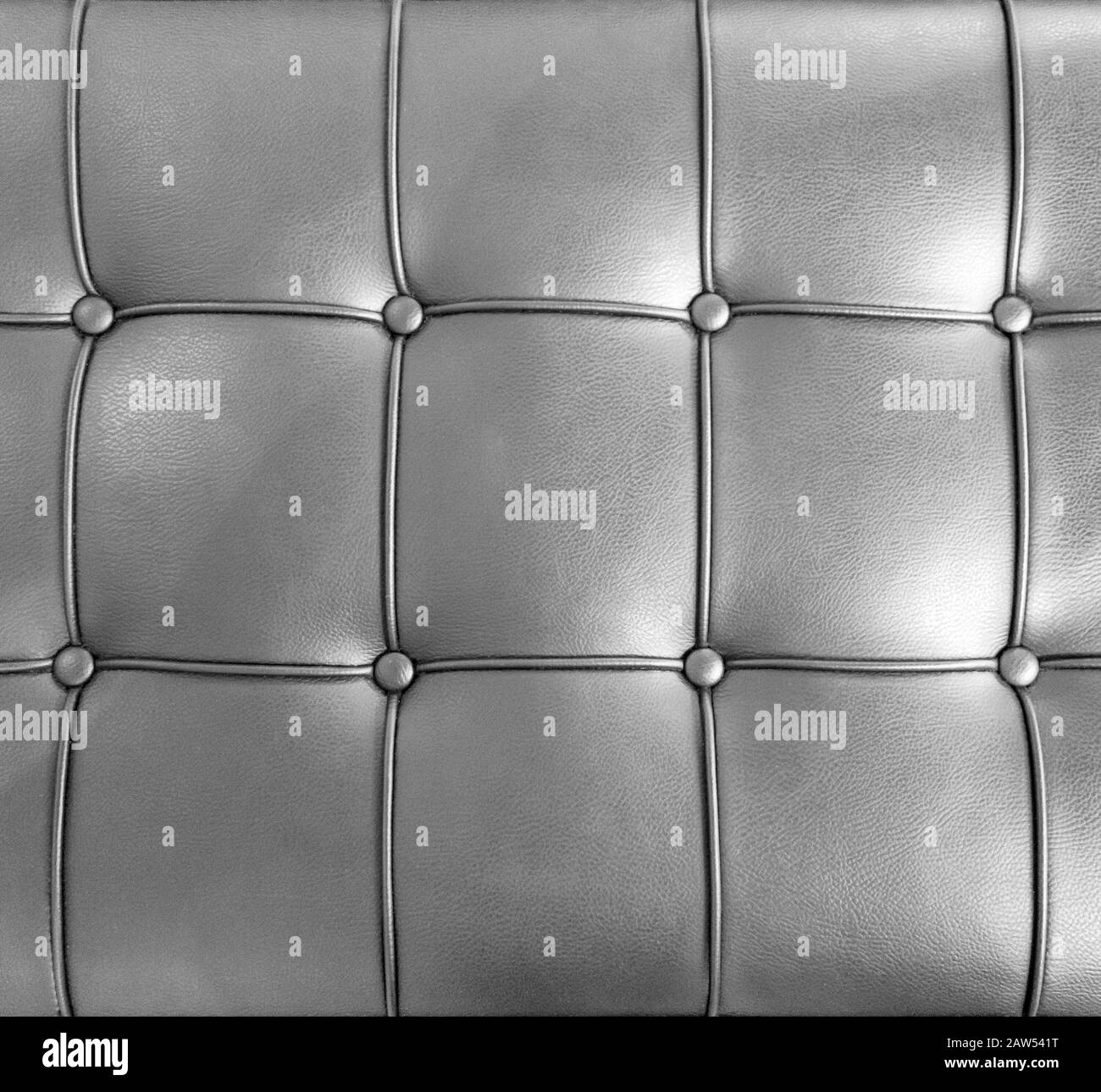 Luxurious black leather texture furniture with buttons Stock Photo - Alamy