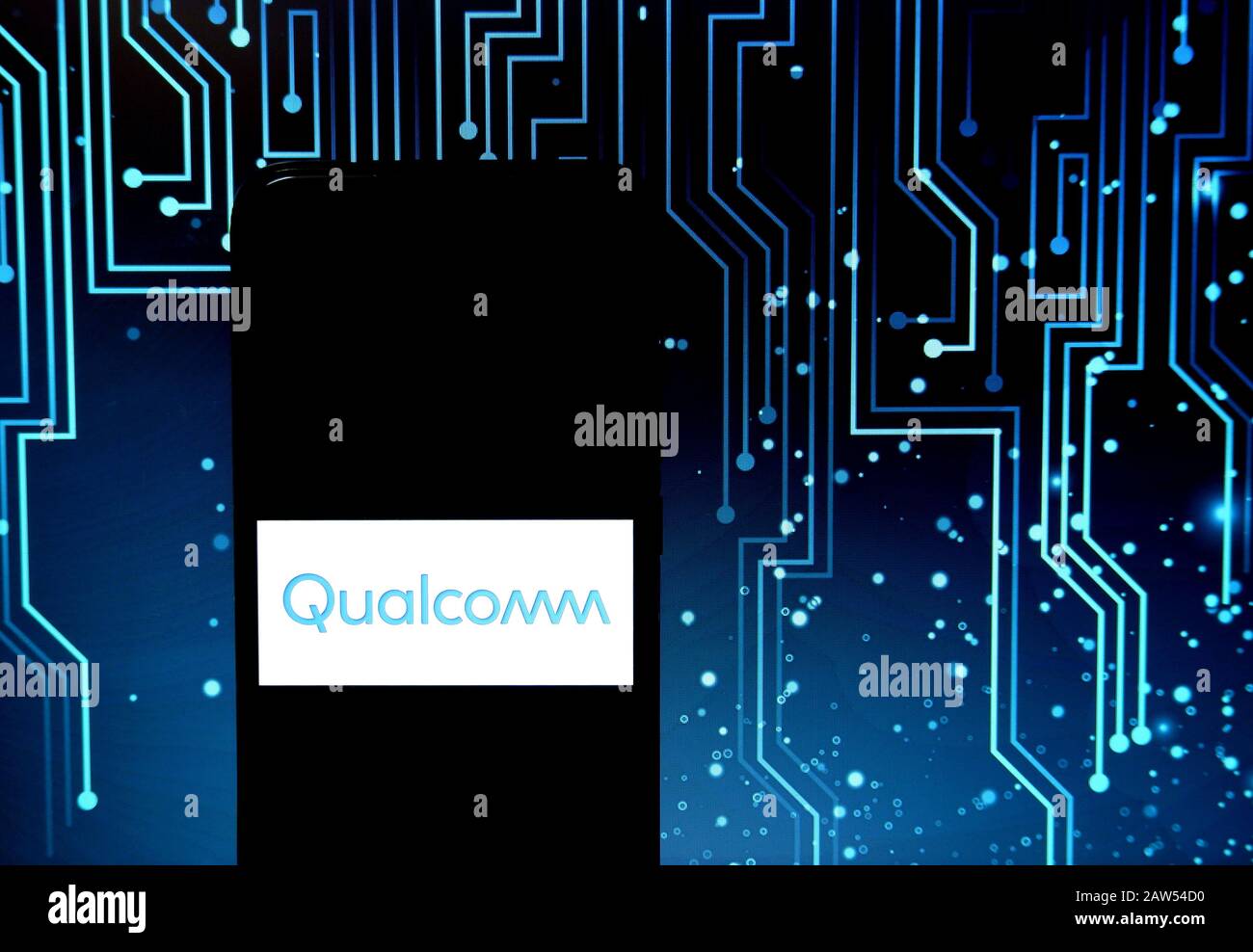 In this photo illustration a QUALCOMM logo seen displayed on a ...