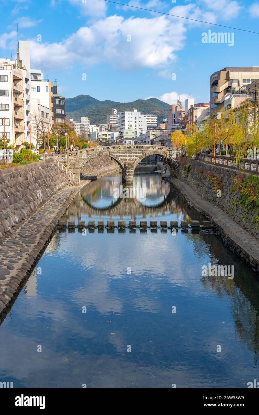Megane Bridge (Spectacles Bridge) in sunny day with beautiful blue sky ...