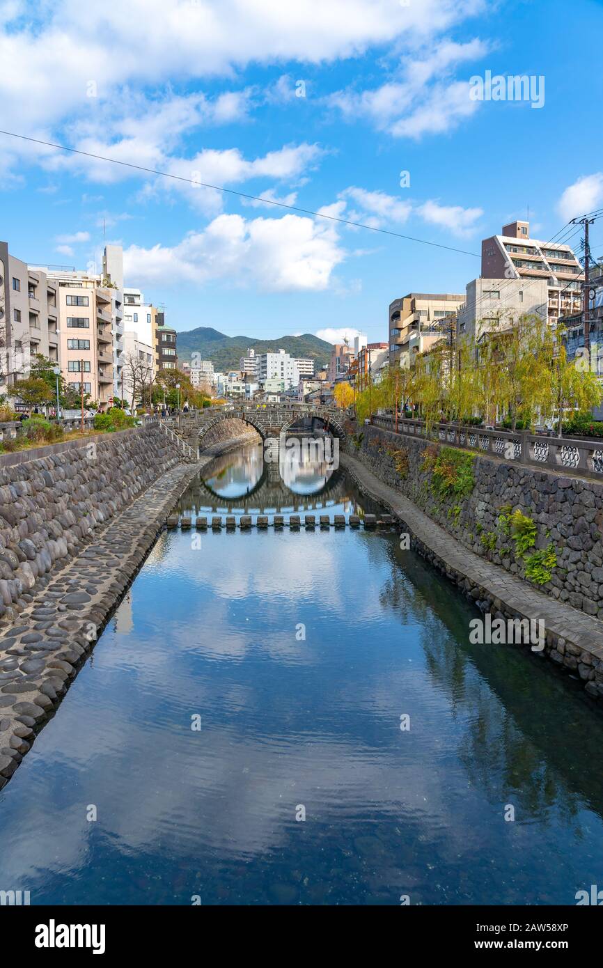 Megane Bridge (Spectacles Bridge) in sunny day with beautiful blue sky ...