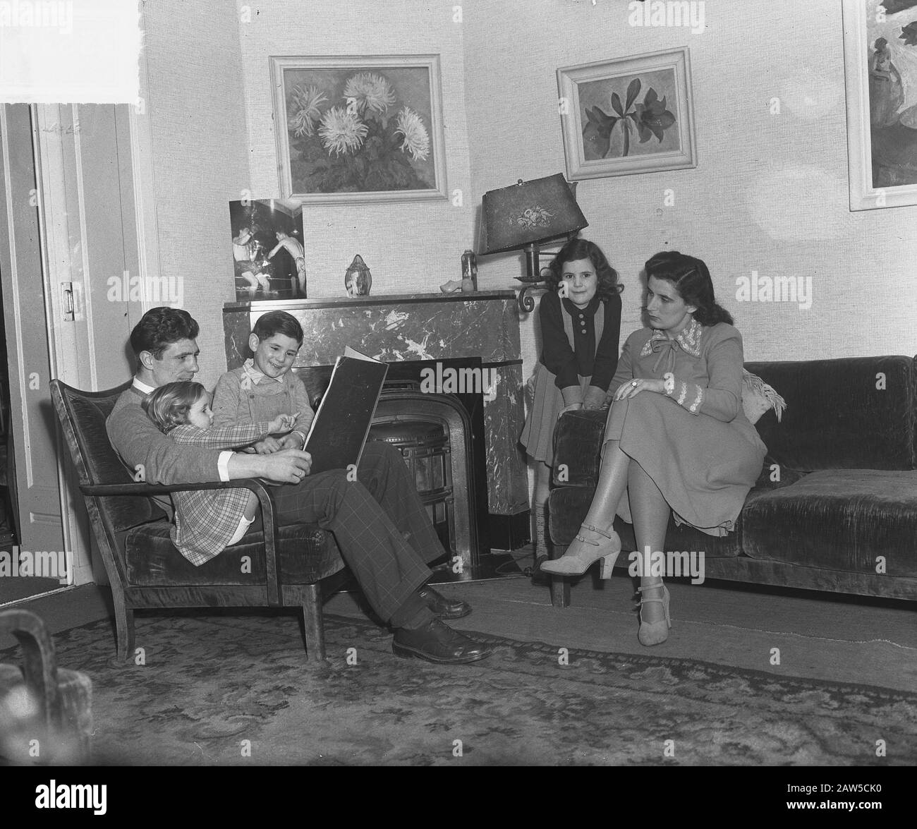 Luc Van Dam at home [with wife and children] Annotation: Luc van Dam ...