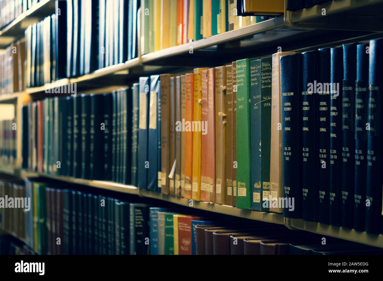 Books on a shelf Stock Photo - Alamy