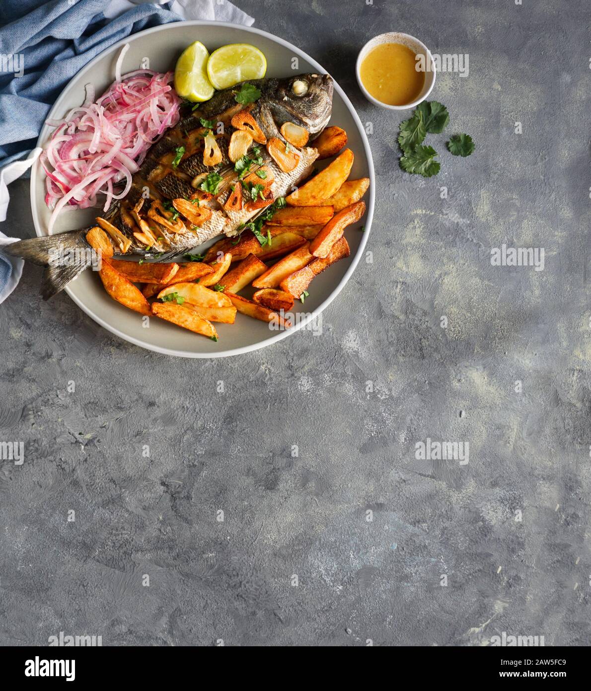 Chita frita al ajo, al ajillo, Peruvian food, a whole fish, served wit ...