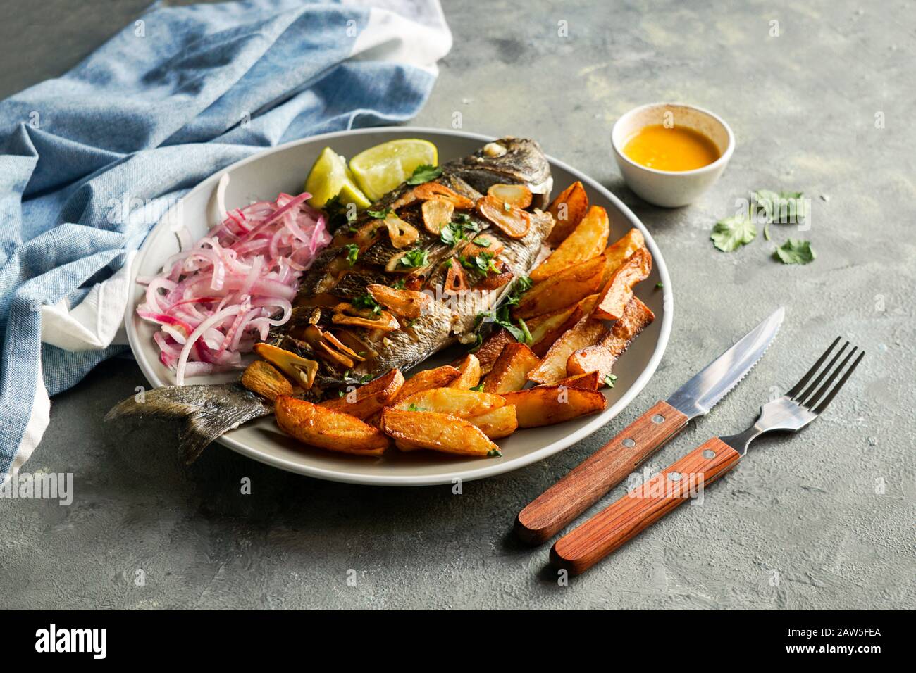 Chita frita al ajo, al ajillo, Peruvian food, a whole fish, served wit ...