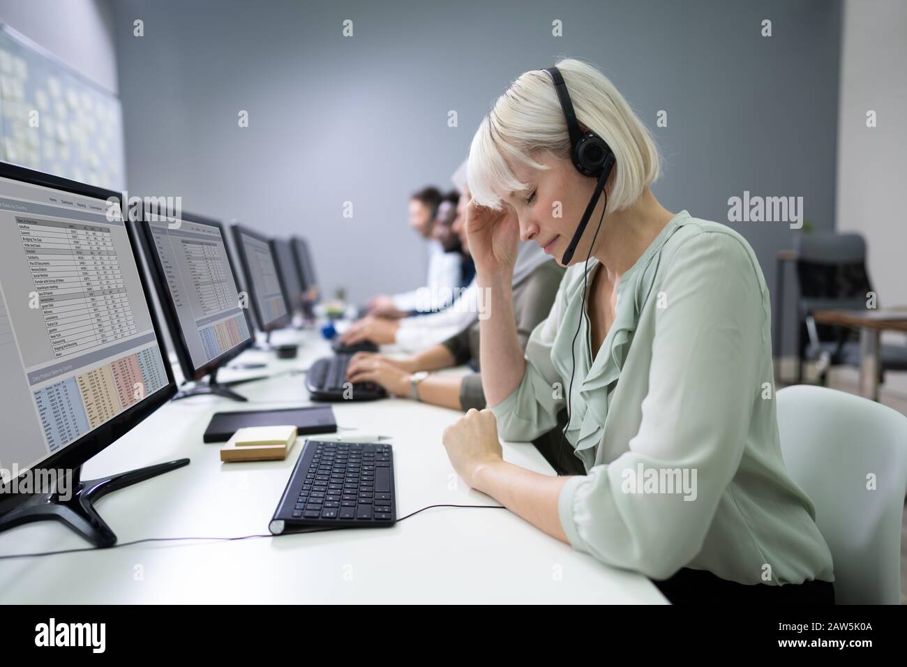 Tired receptionist hi-res stock photography and images - Alamy