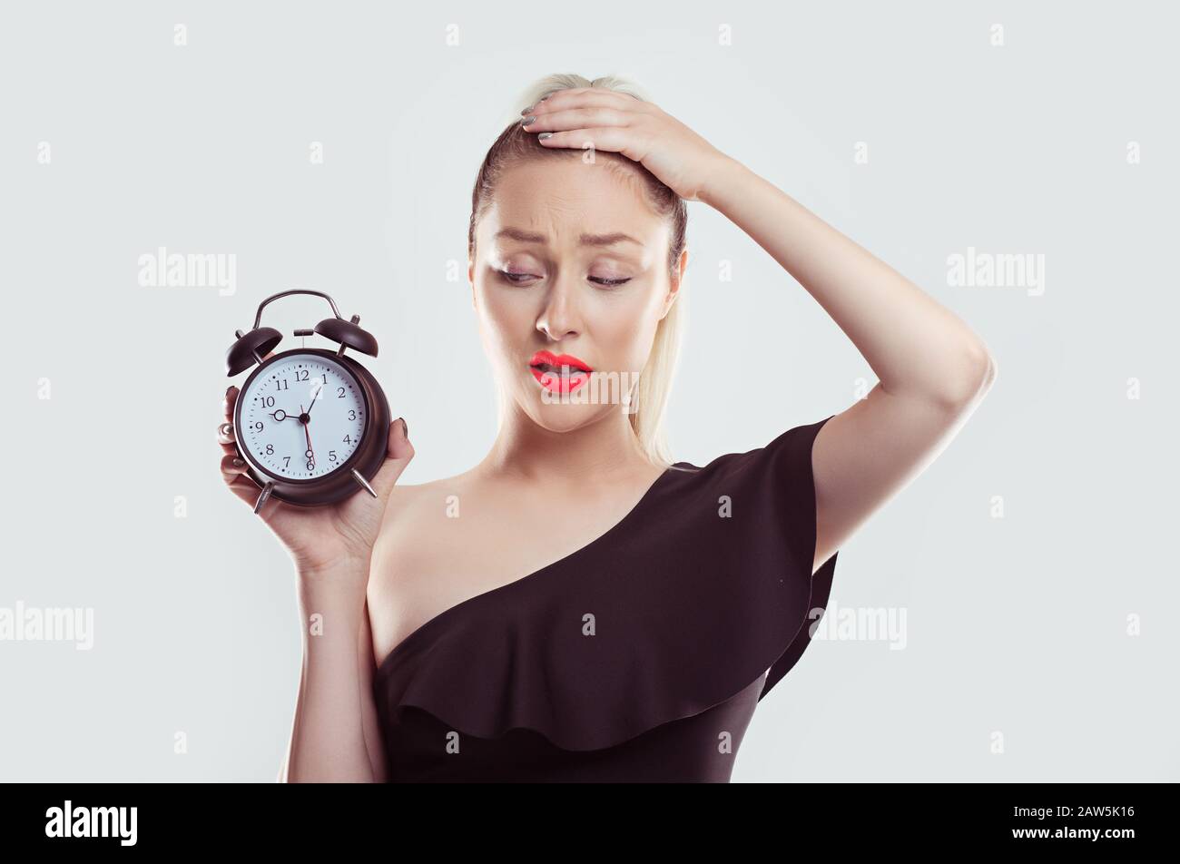 Late. Closeup portrait of stressed woman, student running late with ...