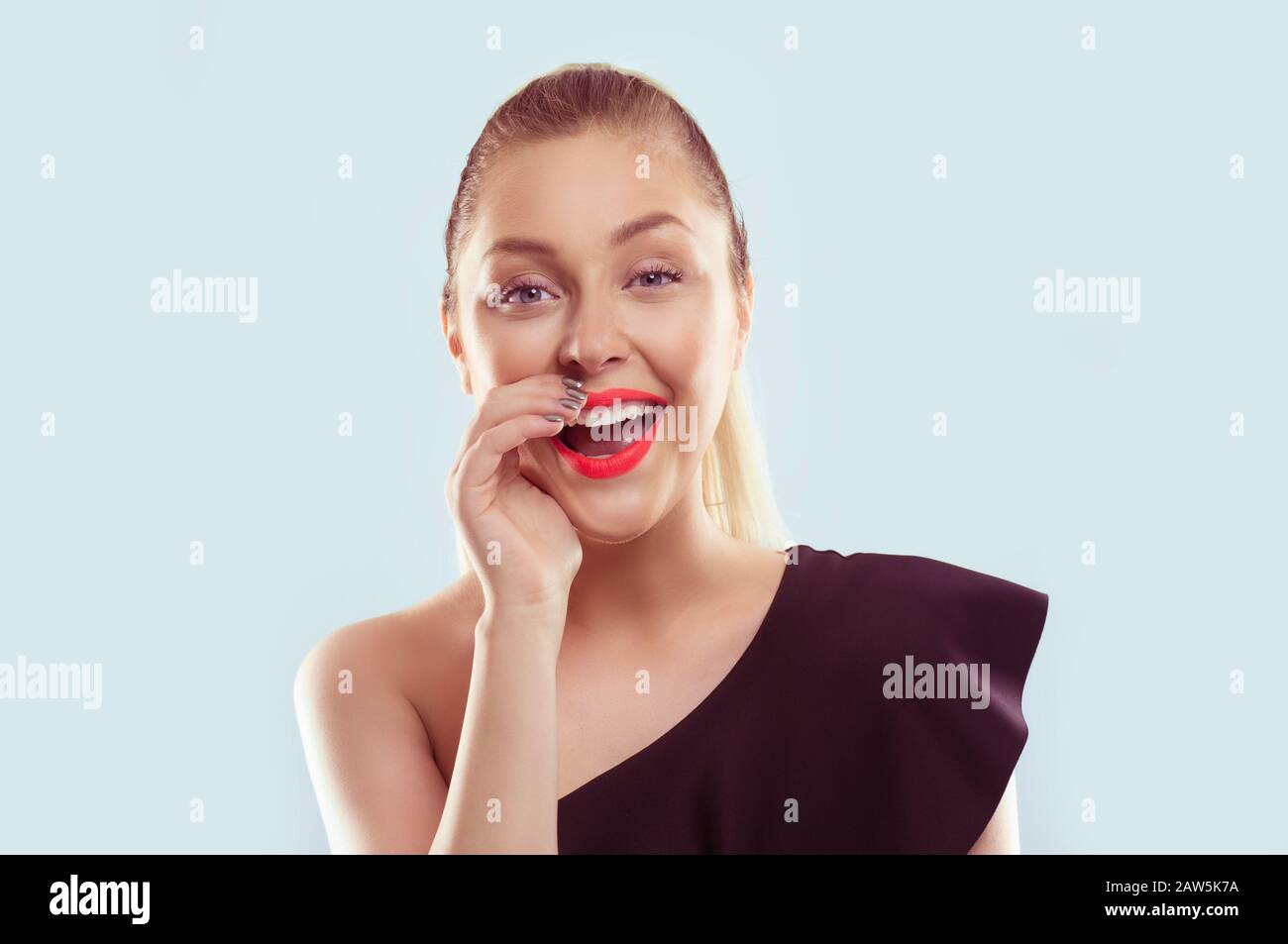 I have a secret to tell you. Girl happy whispering to camera telling ...