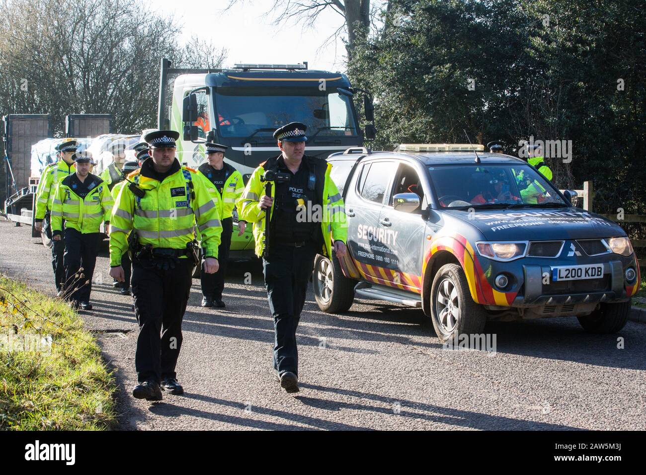 Denham, UK. 6 February, 2020. Police officers arrive to move on ...