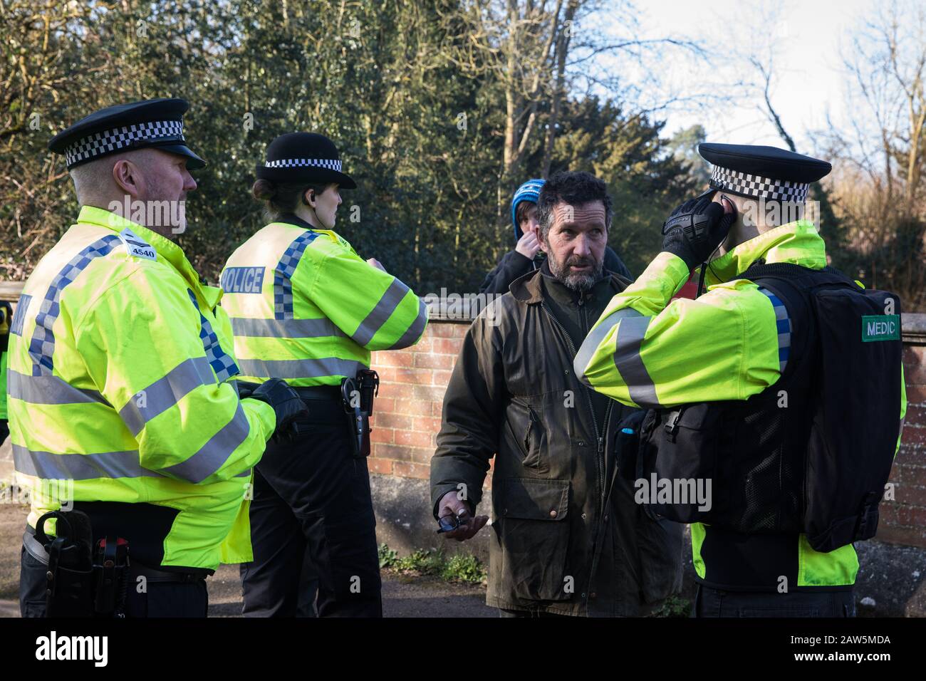 Denham, UK. 6 February, 2020. Police officers move on environmental ...