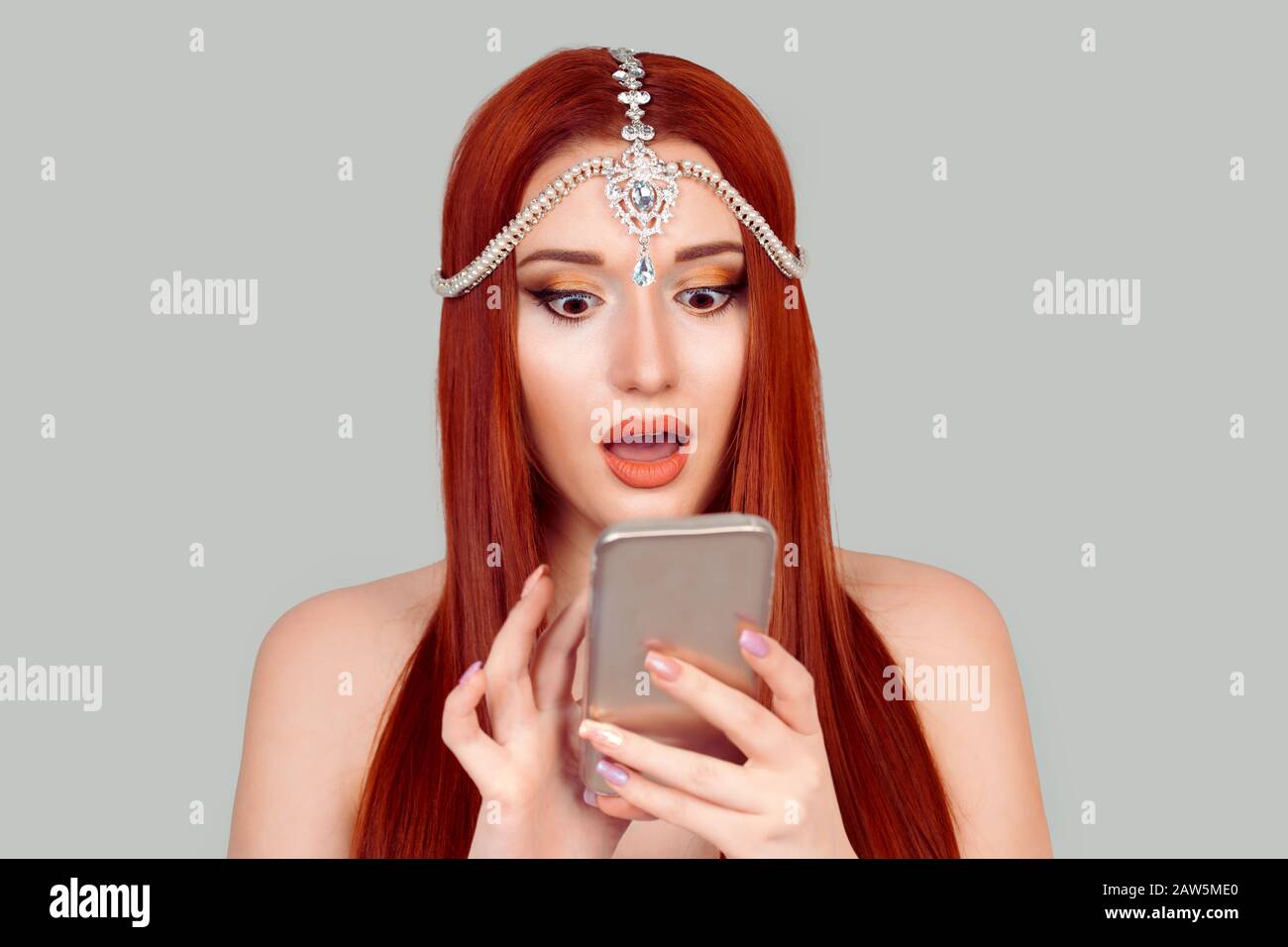 Wow, shocking news by phone. Happy woman in shock looking at mobile ...