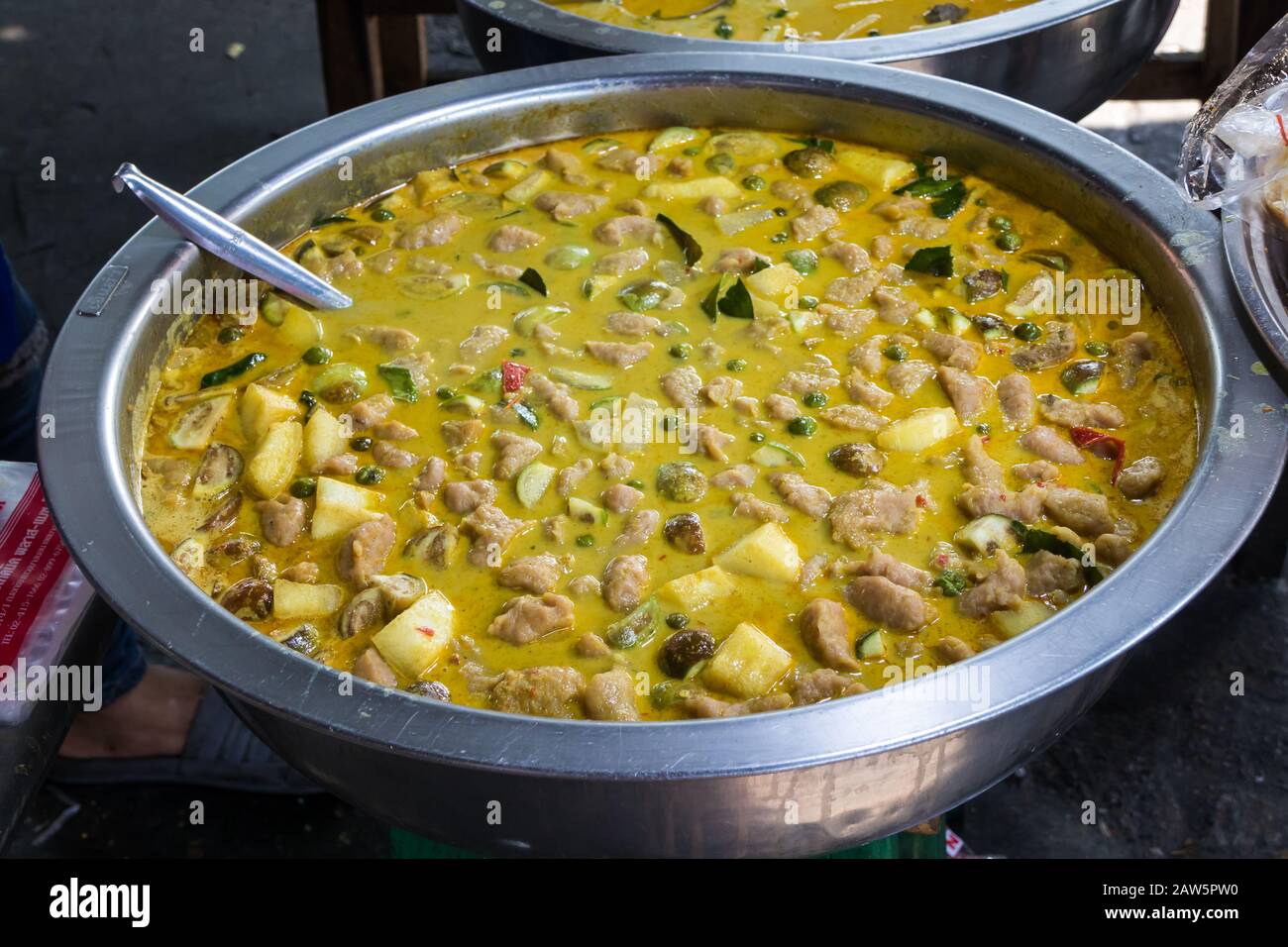 Bowl of Thai curry on a street food stall in Bangkok, Thailand Stock ...