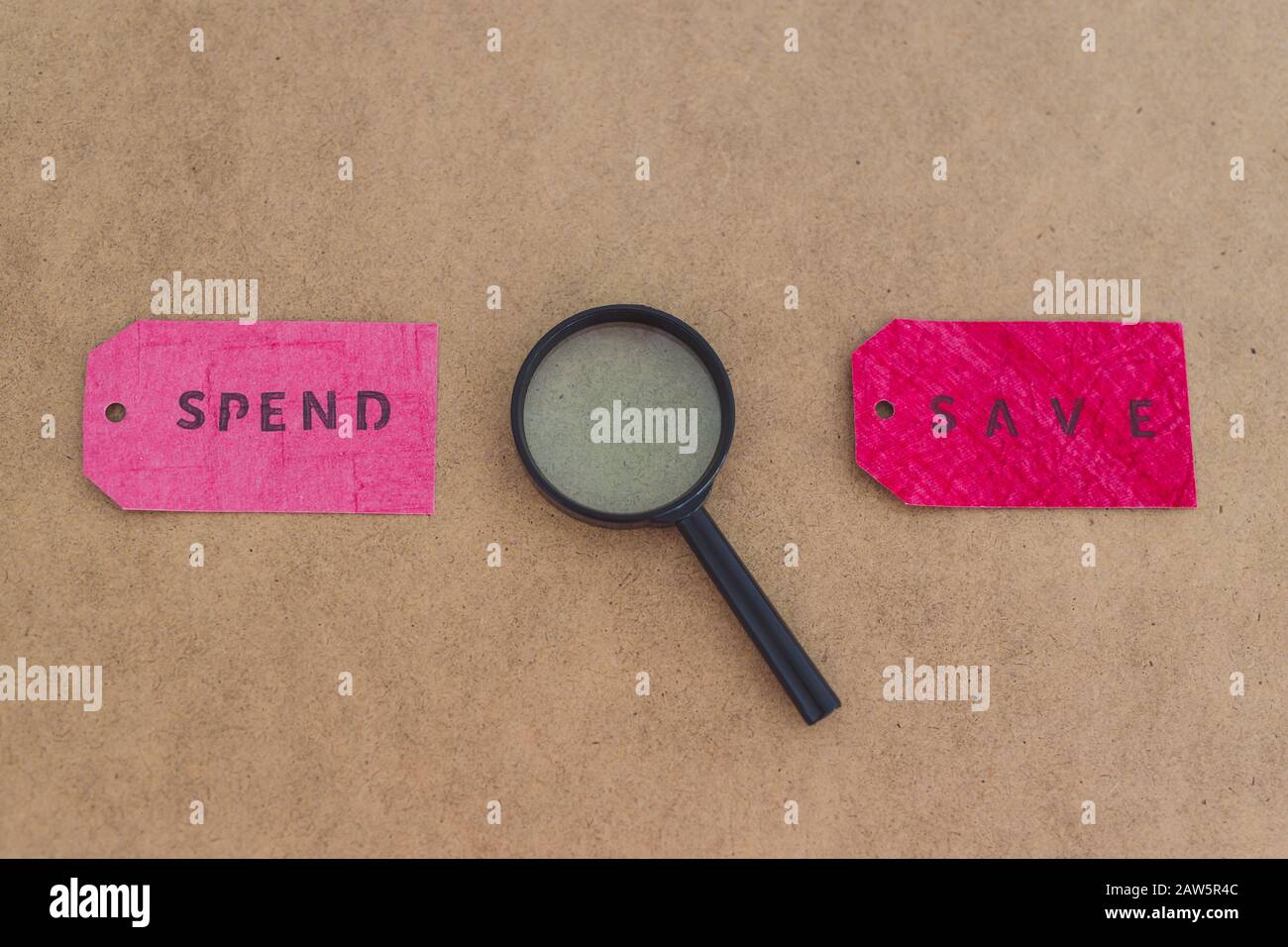 budgeting and managing your finance conceptual still-life, Spend vs ...