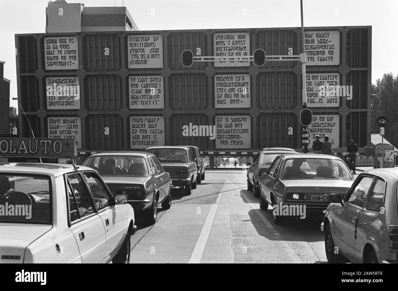 Artwork mounted under the deck of a bridge over the Nieuwe Herengracht ...