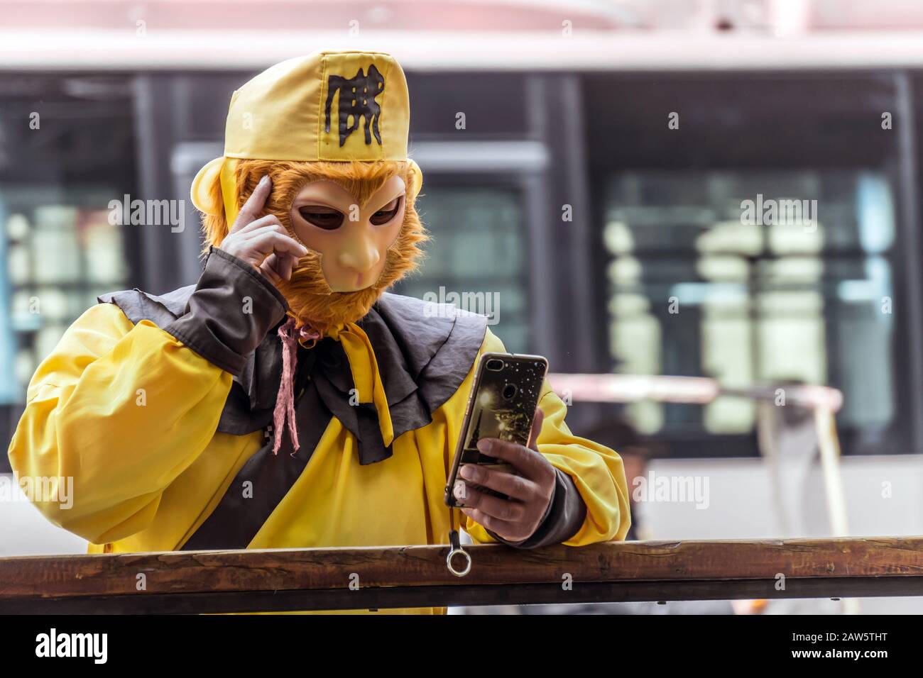 Monkey is holding a phone and thinking . Evolution of the technology ...