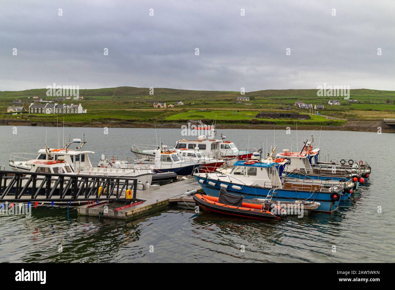 Excursion boats at moorings of Portmagee visitor pontoons, in Portmagee ...