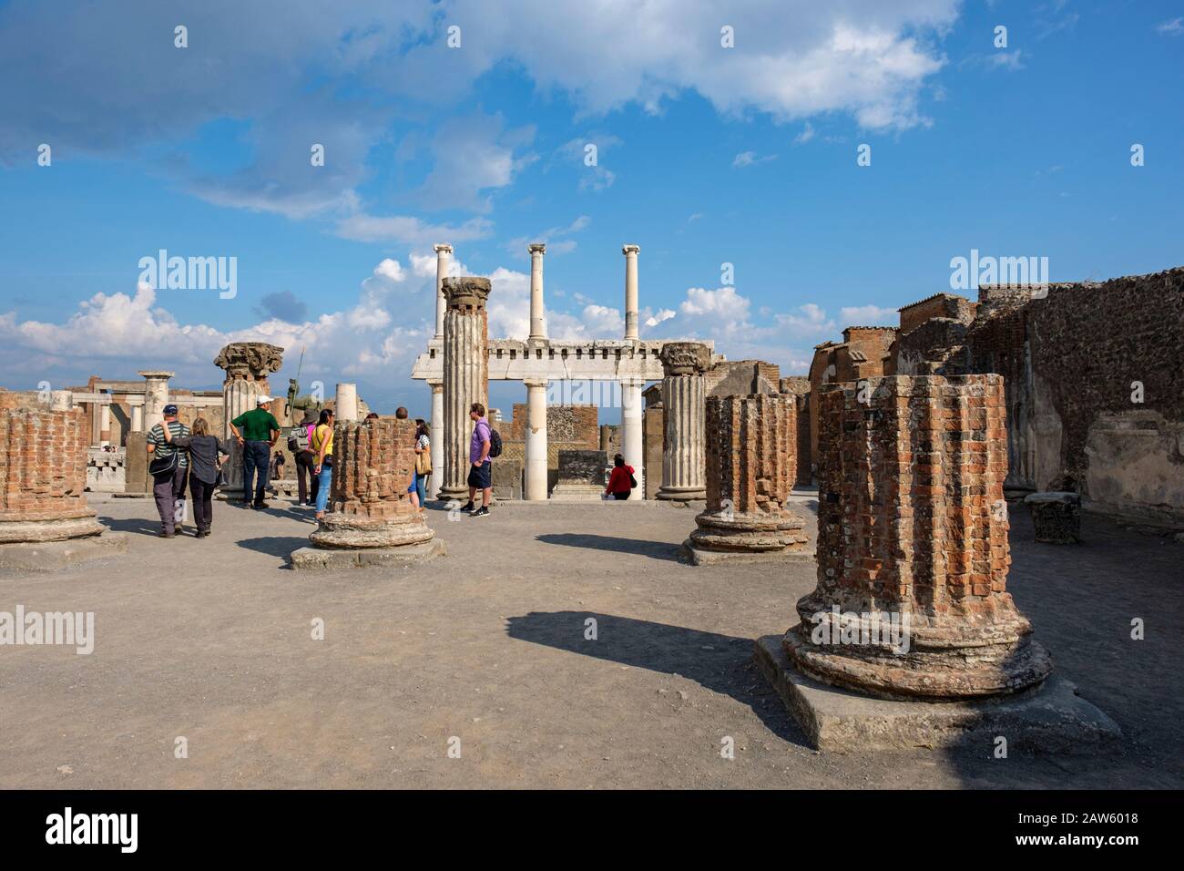 Pompeii ruins, tourists visiting Pompeii Basilica, ancient city of ...