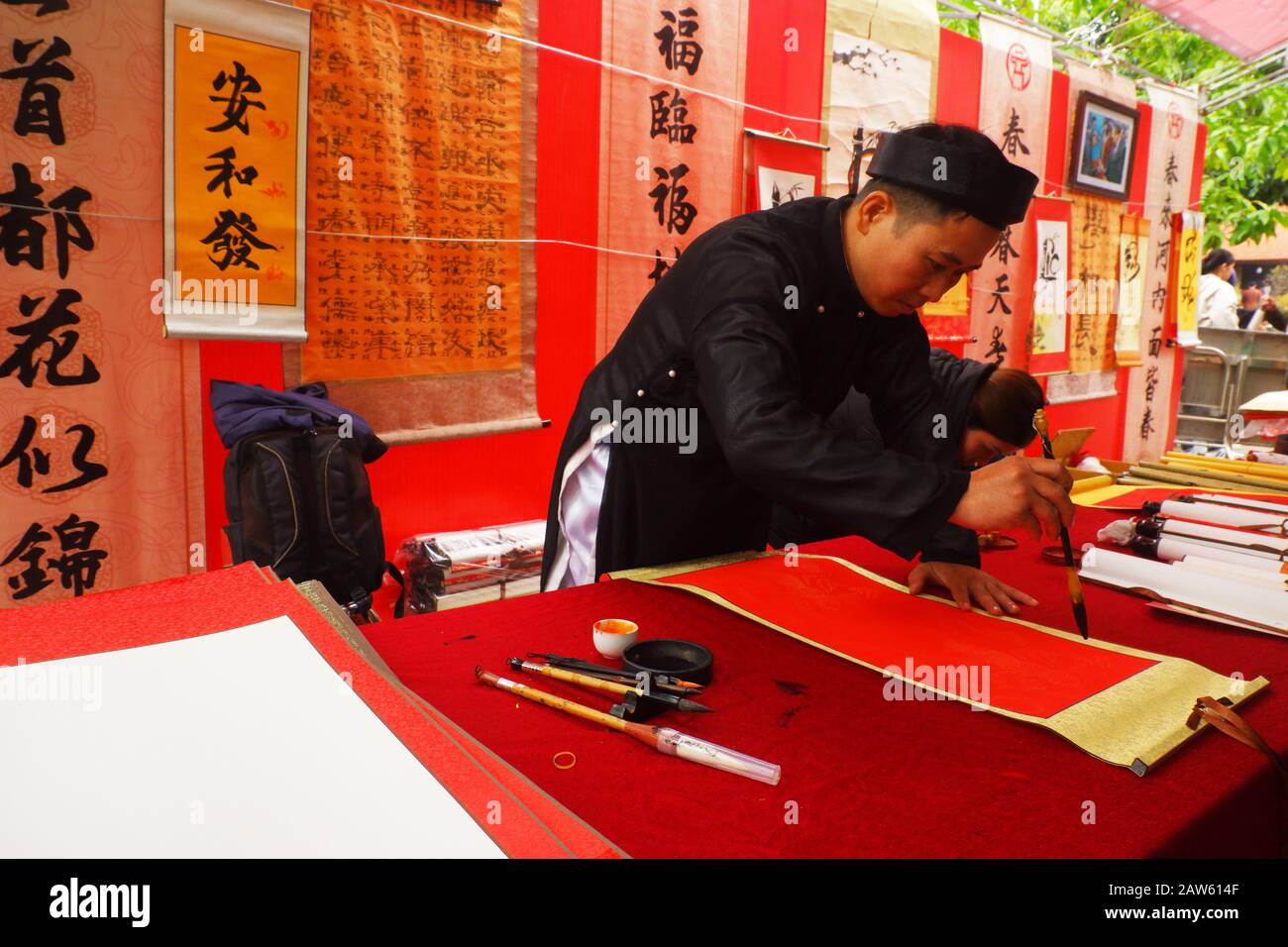 He wrote calligraphy on Tet holiday in Vietnam Stock Photo - Alamy