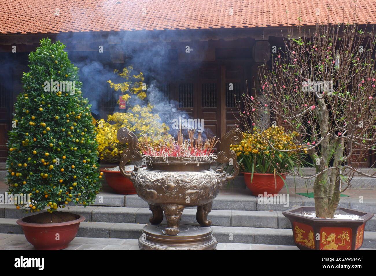 Temple scene on Tet holiday in Vietnam Stock Photo - Alamy