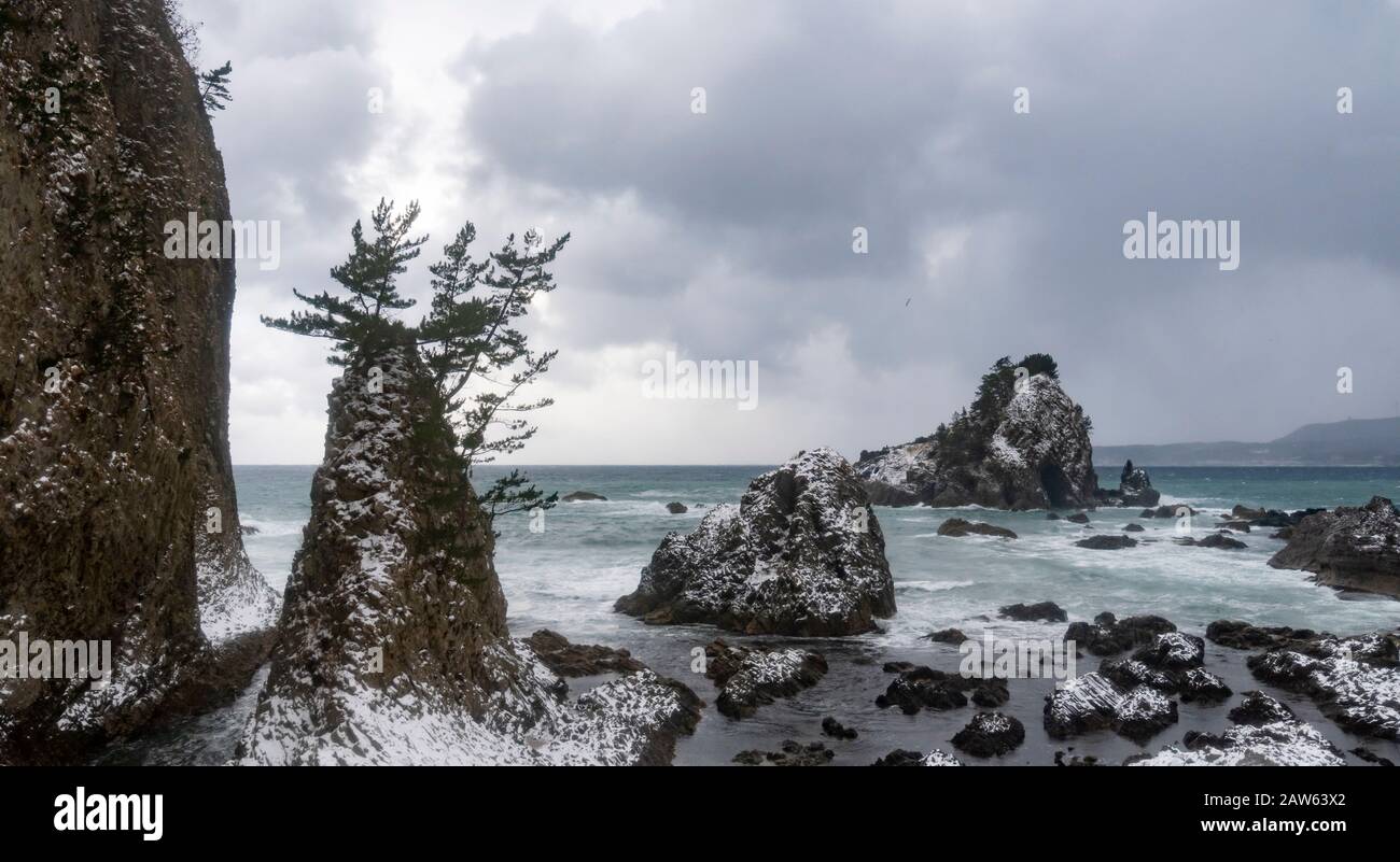 A seastack and rocks on the Sea of Japan coast in Aomori Prefecture ...