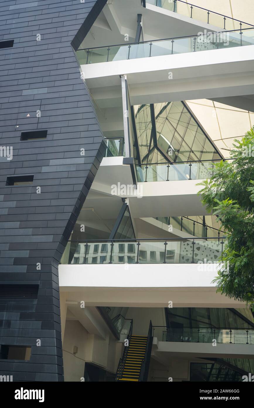 Singapore, April, 2019. Streetside buildings of Singapore, officially ...