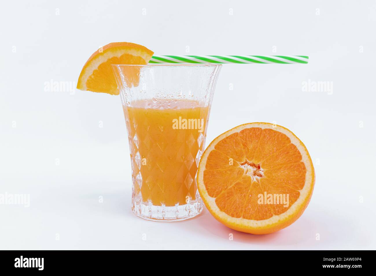 Orange slice and a nutritious orange juice Stock Photo - Alamy
