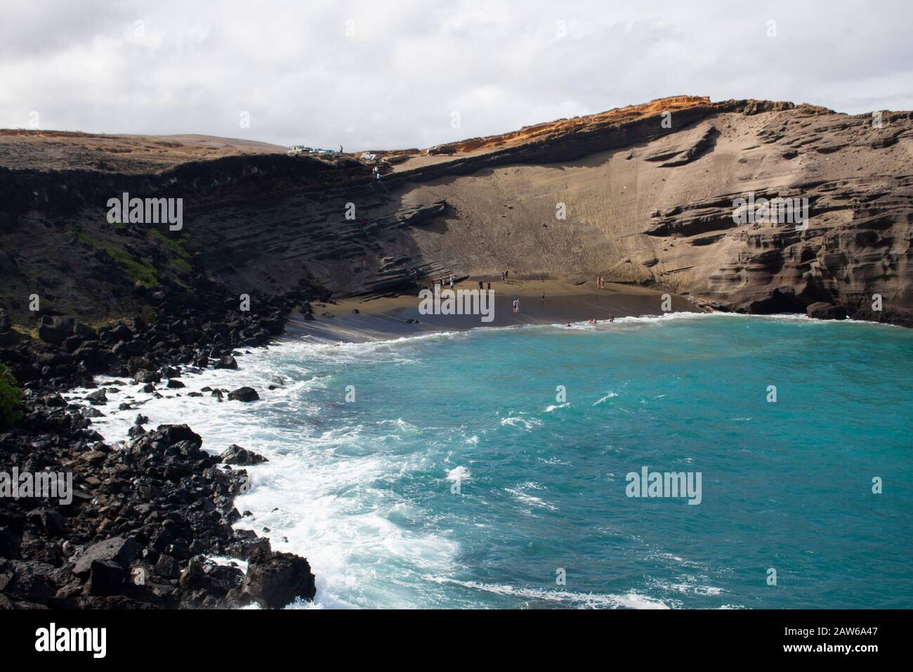View of Green Sand Beach bay with surrounding rocks and cliff Stock ...