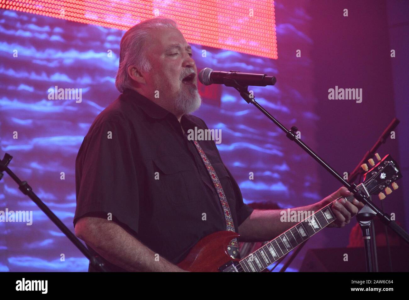 David Hidalgo of Los Lobos performs on stage at Gibson guitars booth ...