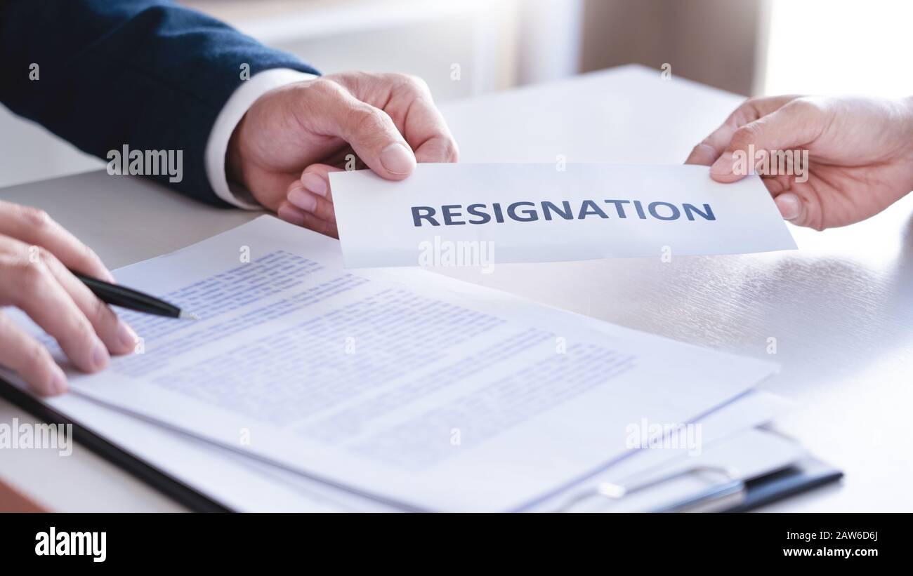 Employee businessman submit or sending resignation document letter to ...