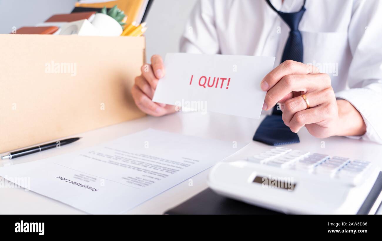 Businessman holding with I quit words card letter, resign employee ...